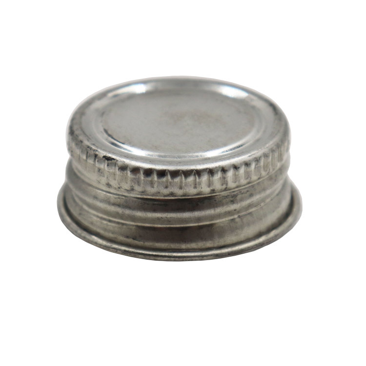 1" Delta Metal Cap w/ .045 Pulp & Aluminum Foil Liner. Pipeline Packaging